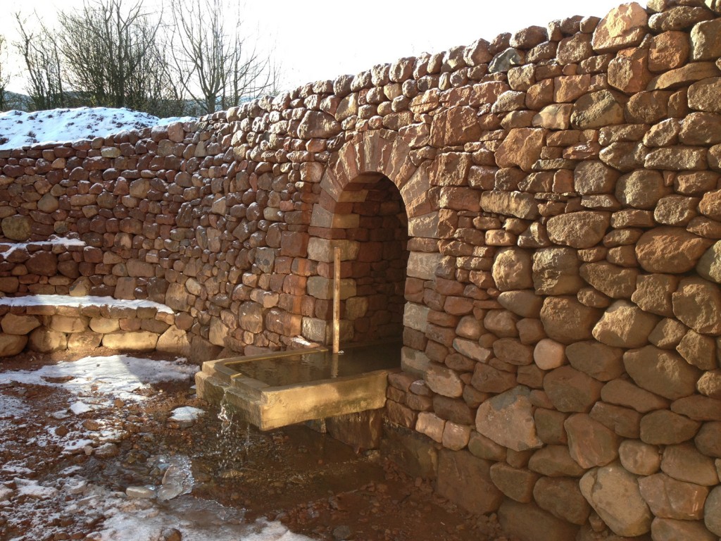 Stone Inspired Recessed arch and retaining walls - Stone Inspired