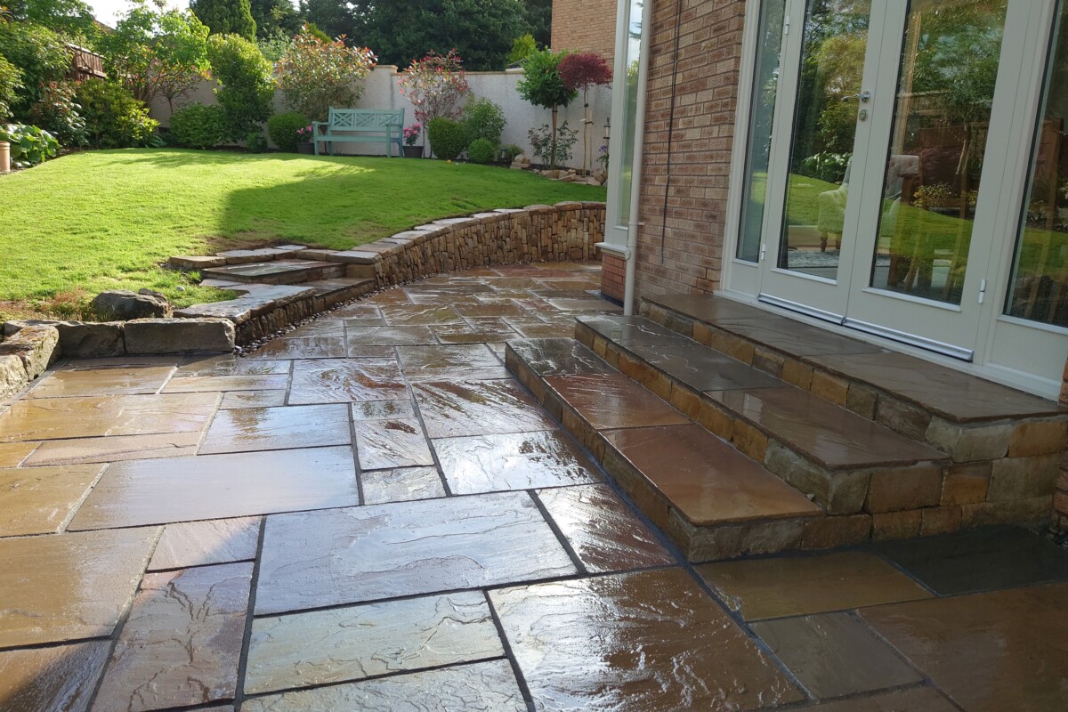 Stone Inspired Livingston back garden patio and dry stone retaining ...