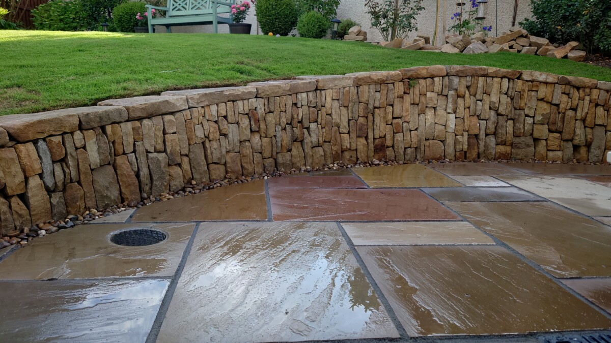 Stone Inspired Livingston back garden patio and dry stone retaining ...