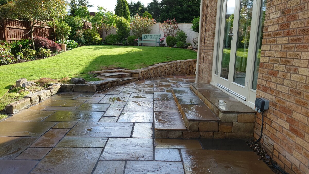 Stone Inspired Livingston back garden patio and dry stone retaining ...